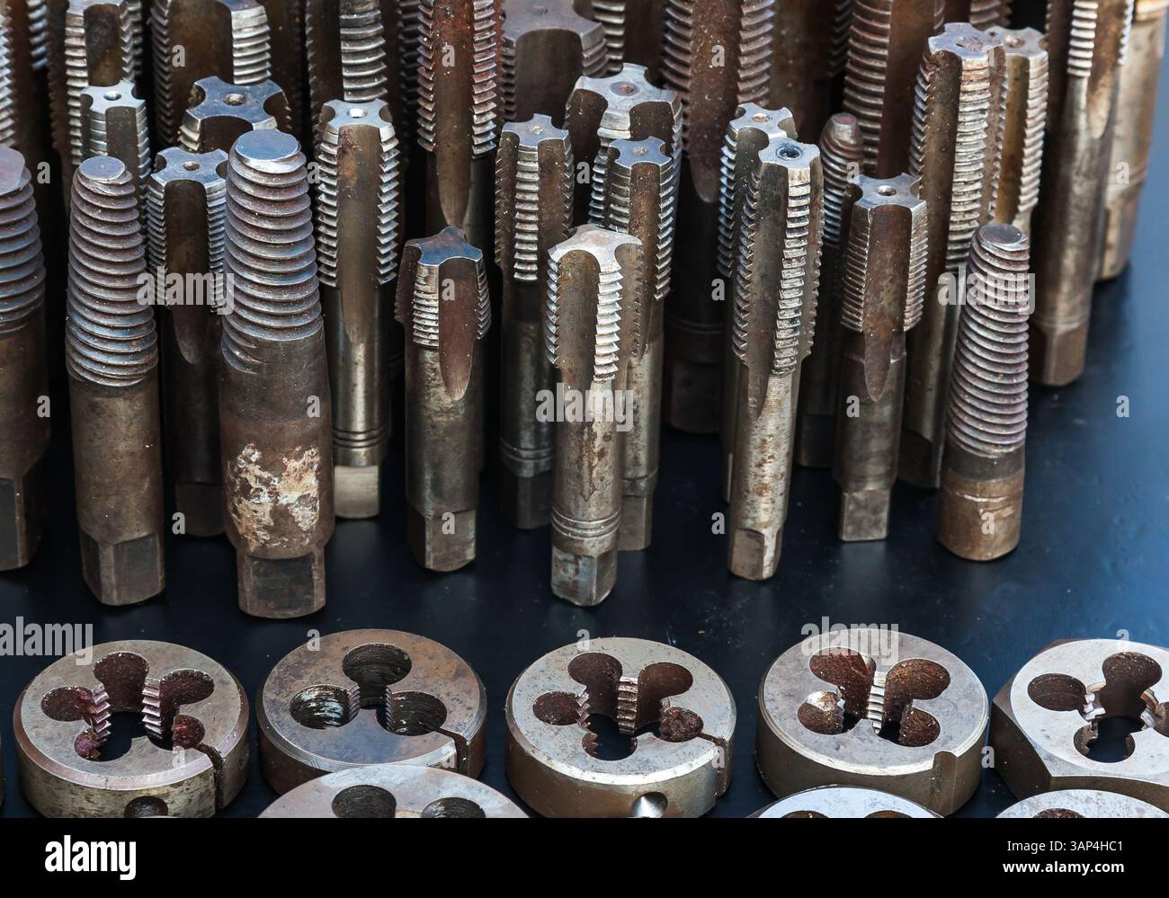 Taps and dies for metal threading. Tools for cutting external and ...