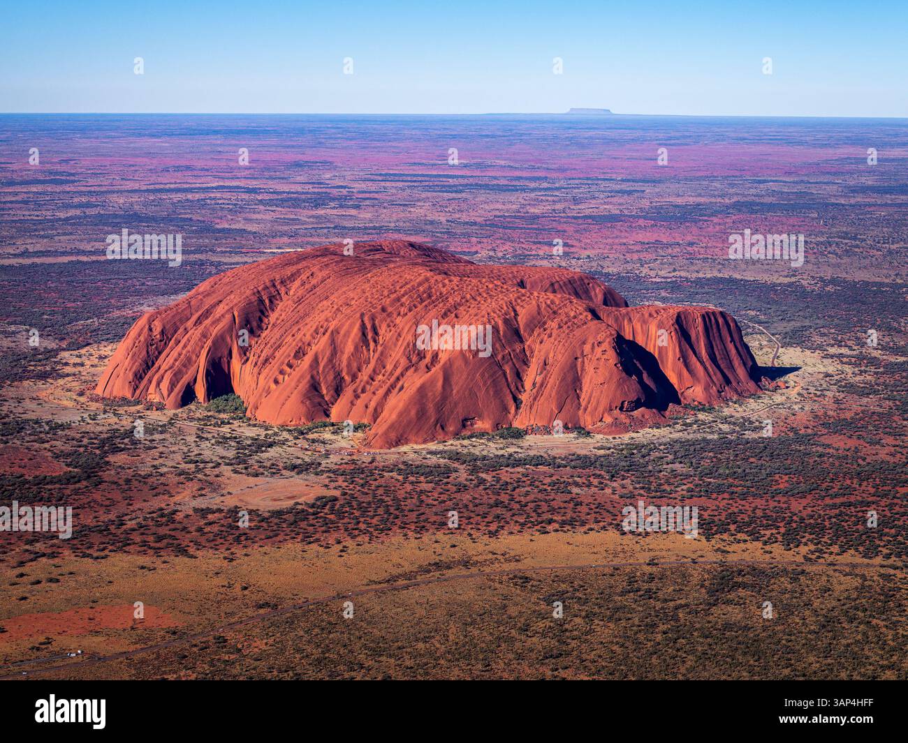 Aerial view of Uluru looking to Mount Connor, Petermann, Australia ...