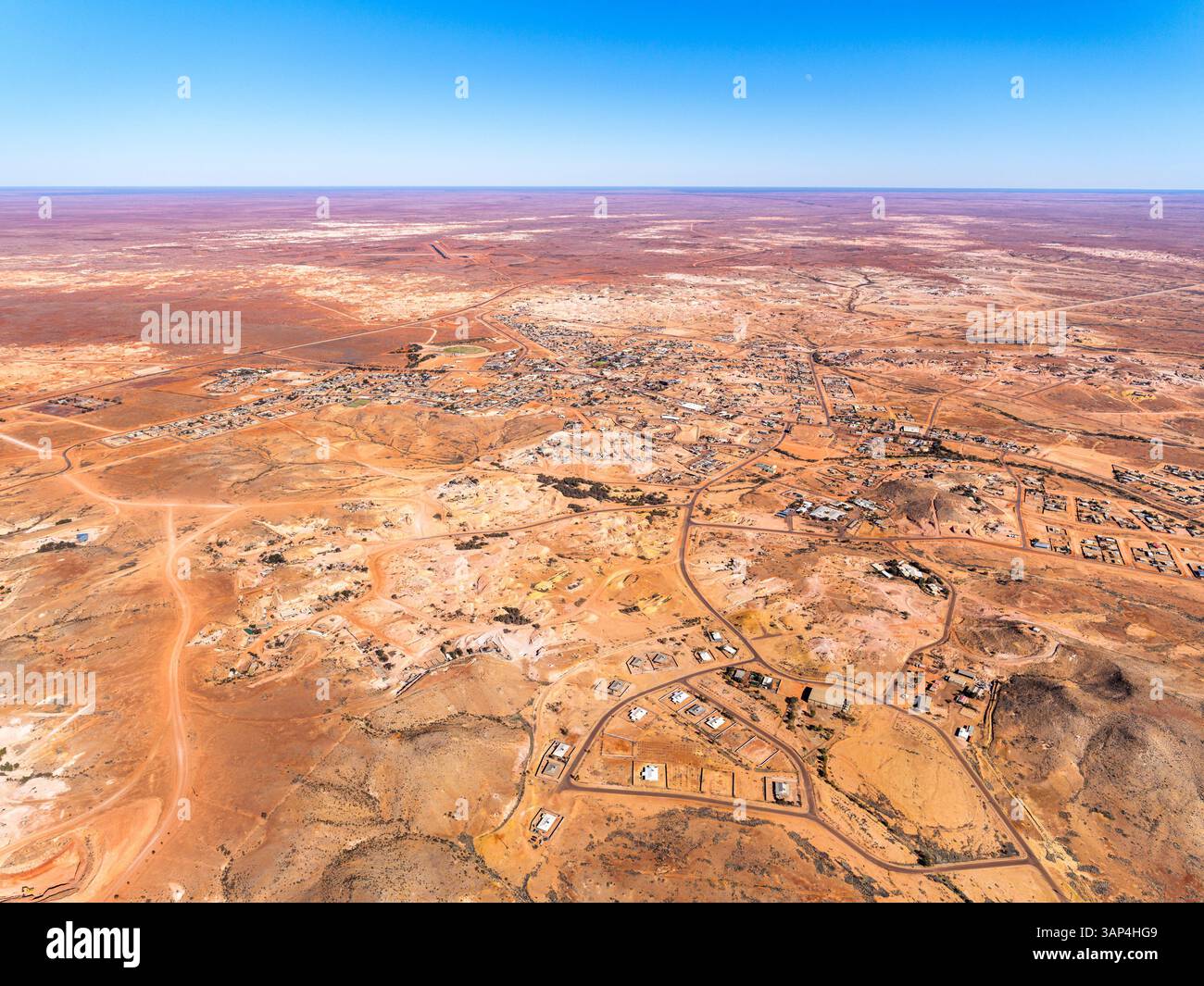 Aerial view of remote opal mining town in arid desert terrain, Coober ...