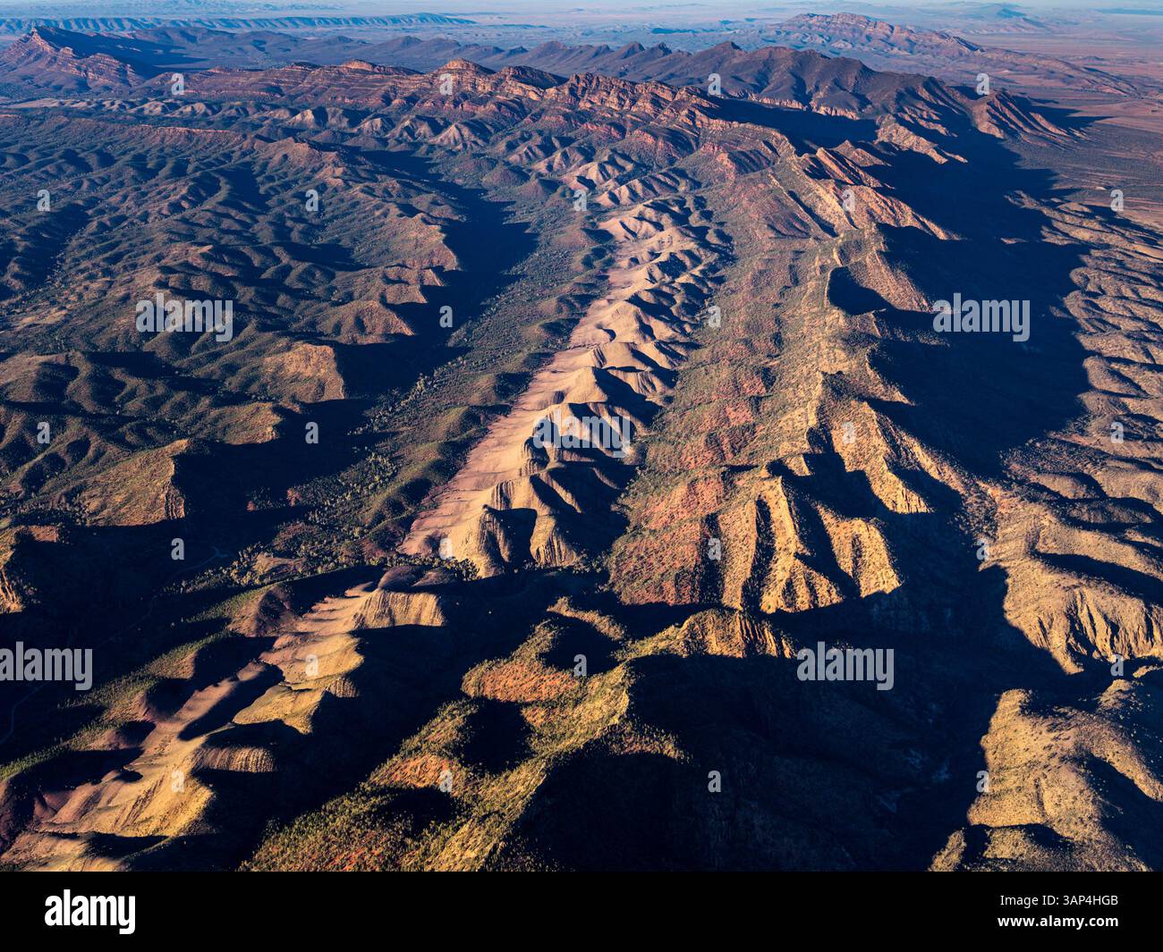 Aerial view of Wilpena Pound with rugged mountains, elevated ridges and dry terrain, Willow ...
