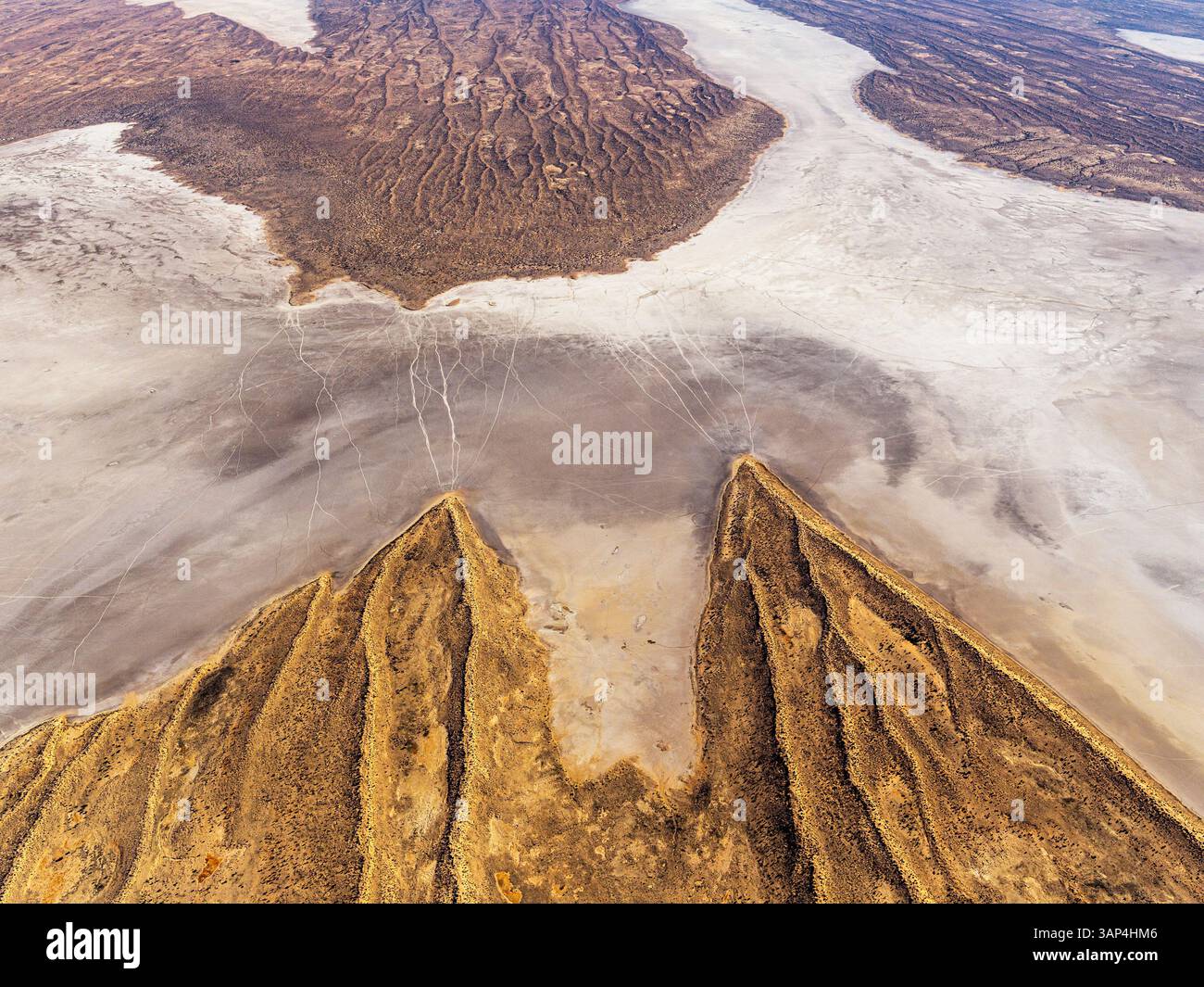 Aerial view of Simpson Desert sand dunes and rugged terrain, Kalamurina ...