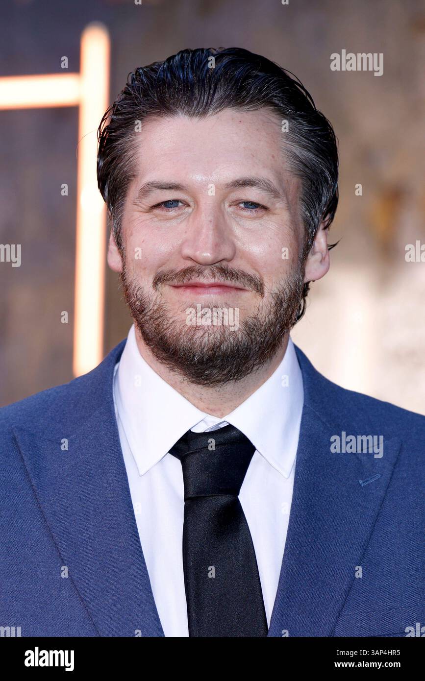 Director Gareth Evans poses for photographers upon arrival at the World ...