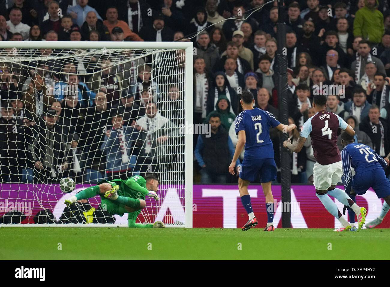 Aston Villa's Ezri Konsa, second right, scores his side's third goal ...