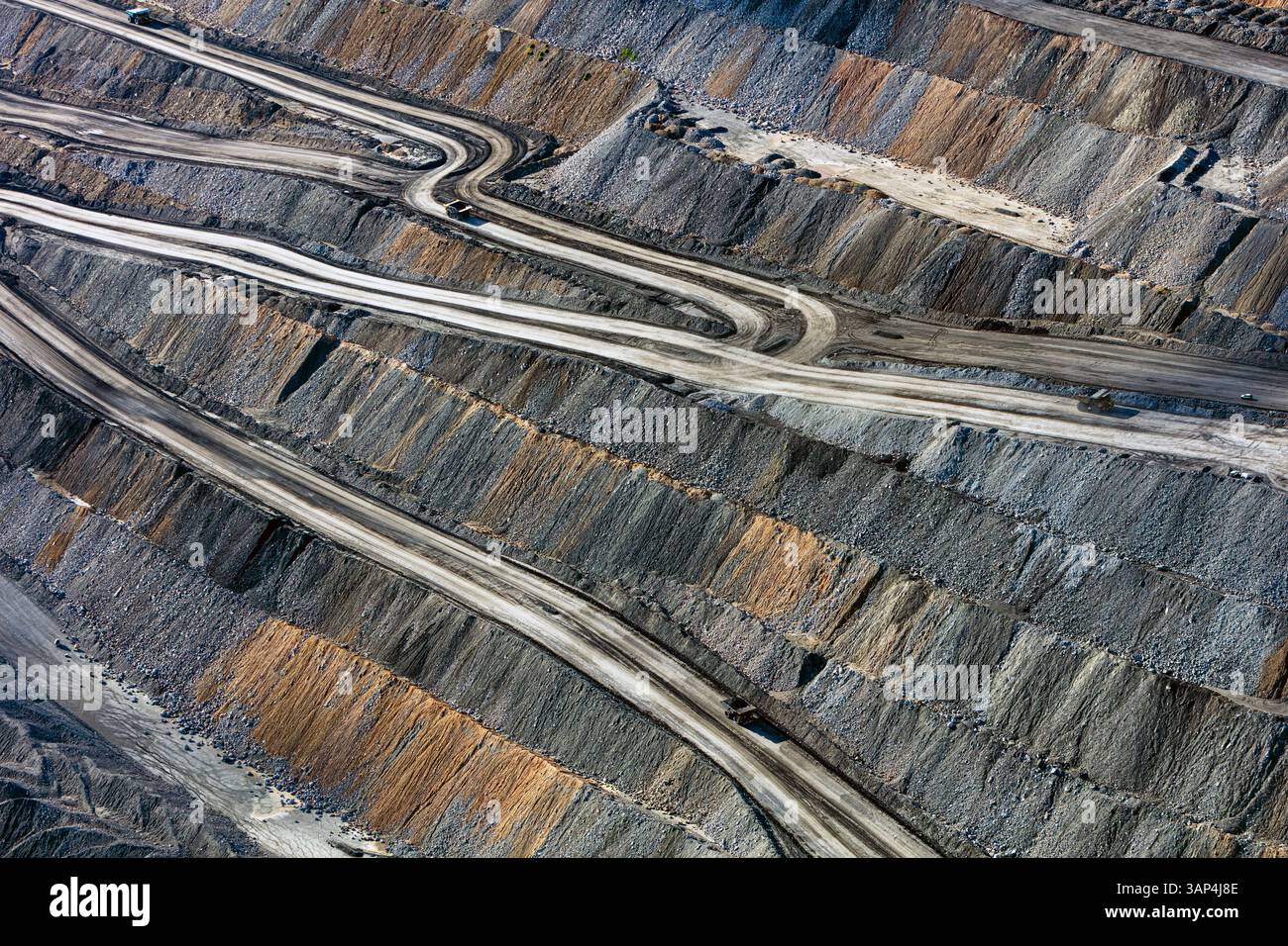 Aerial view of open cut coal mining with roads and layers of earth ...