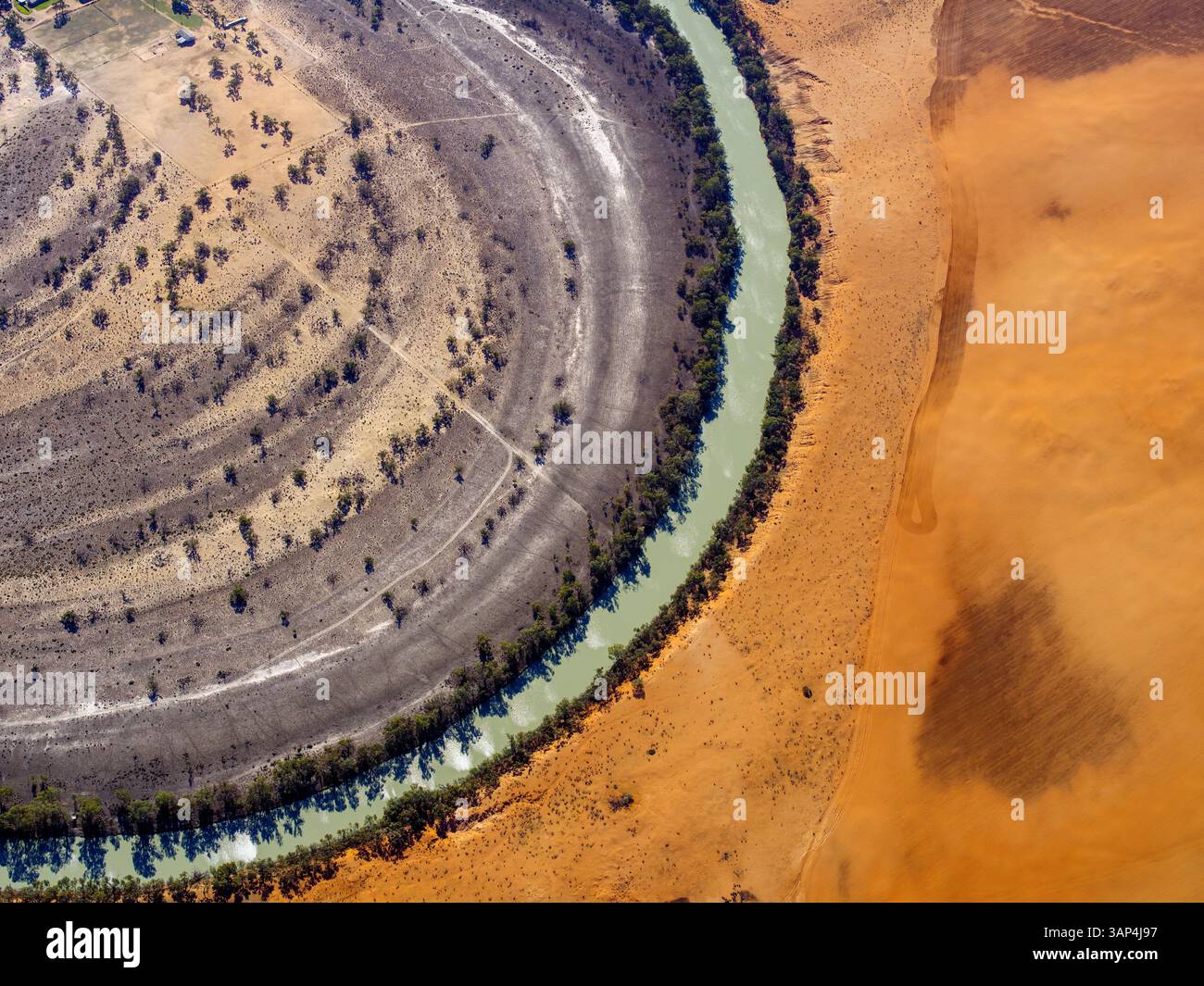 Aerial view of meandering Darling River Anabranch in arid outback with ...