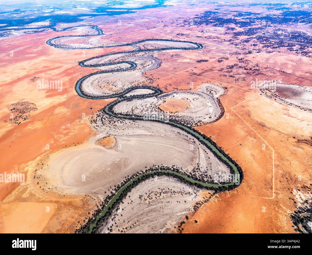 Aerial view of meandering river through red earth desert, Darling River ...