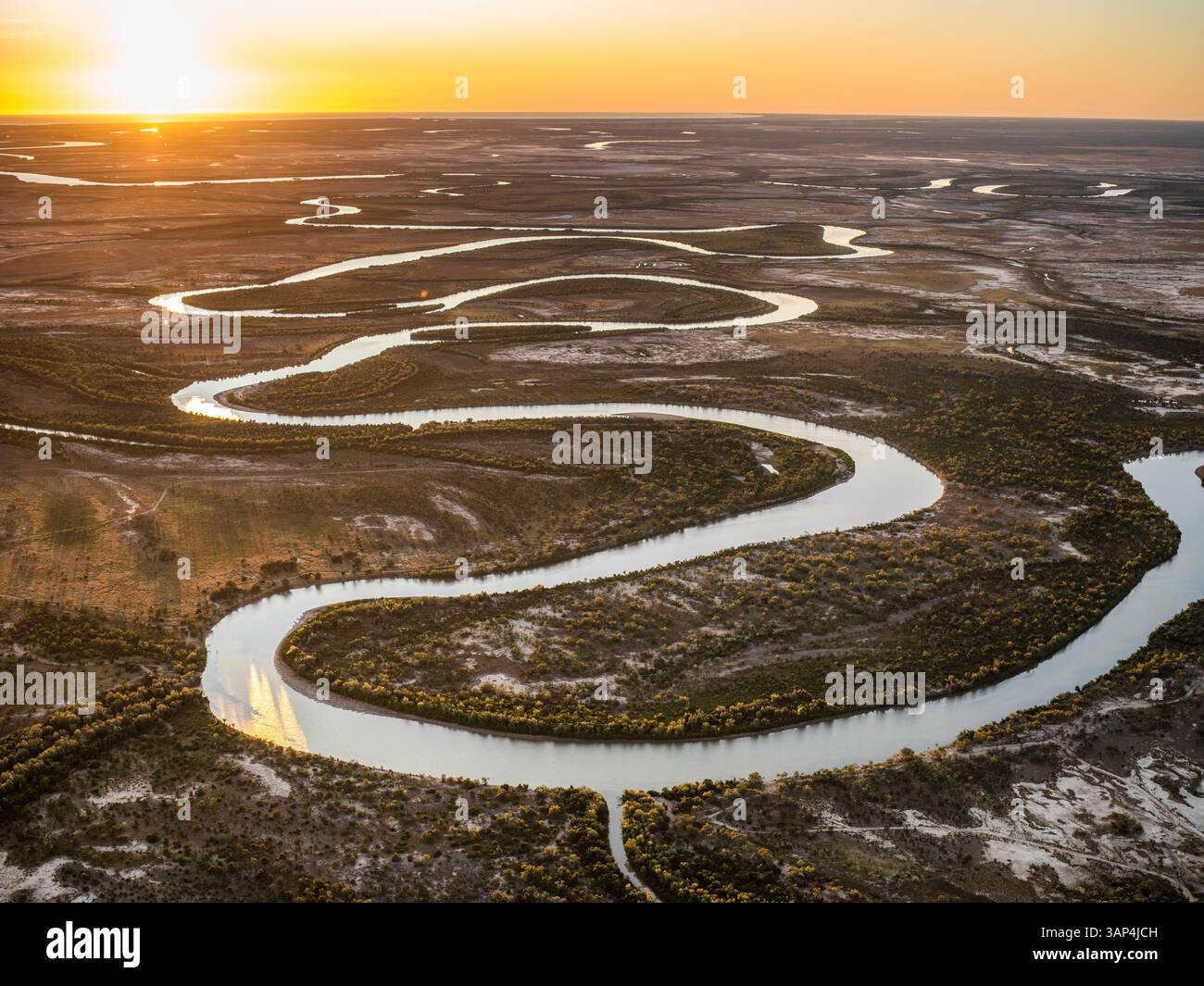 Aerial view of winding Albert River at sunset, Gulf of Carpentaria ...