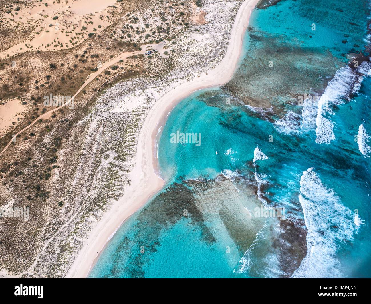 Aerial view of Ningaloo Reef and turquoise ocean coast, Lyndon, Western ...