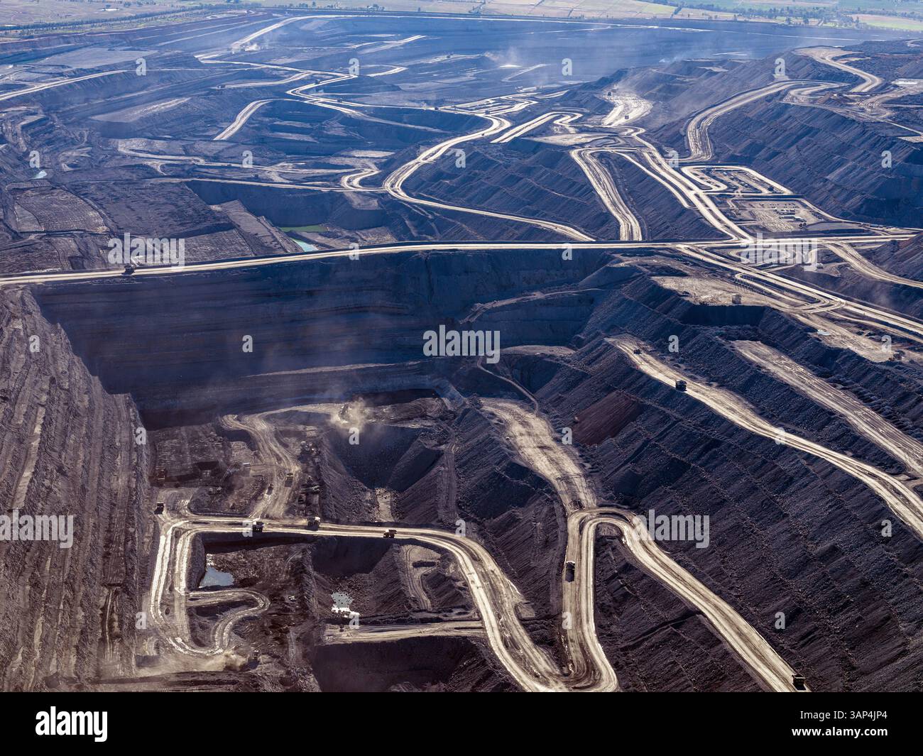 Aerial view of open cut coal mining with roads and excavation, Edderton ...