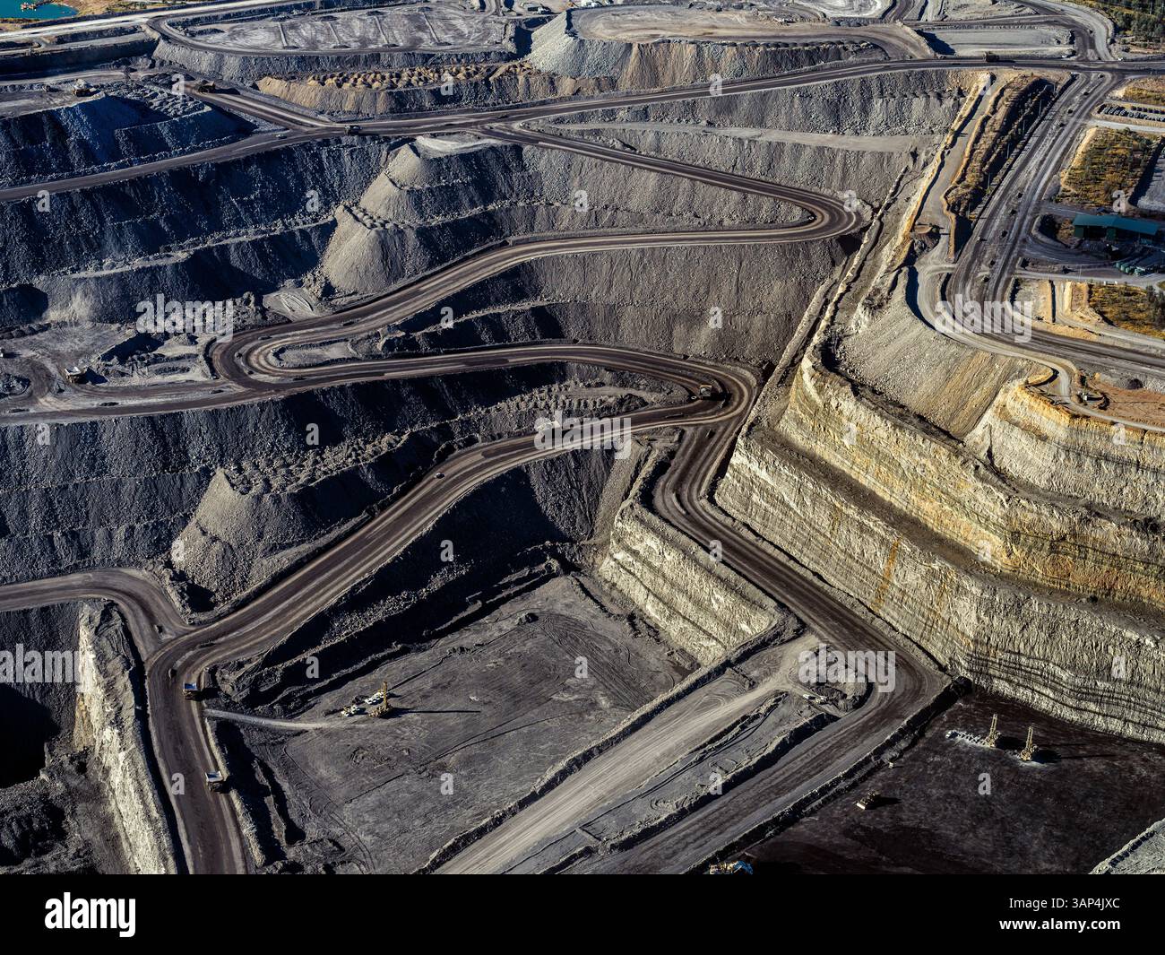 Aerial view of open cut coal mining with roads and layers, Mount ...