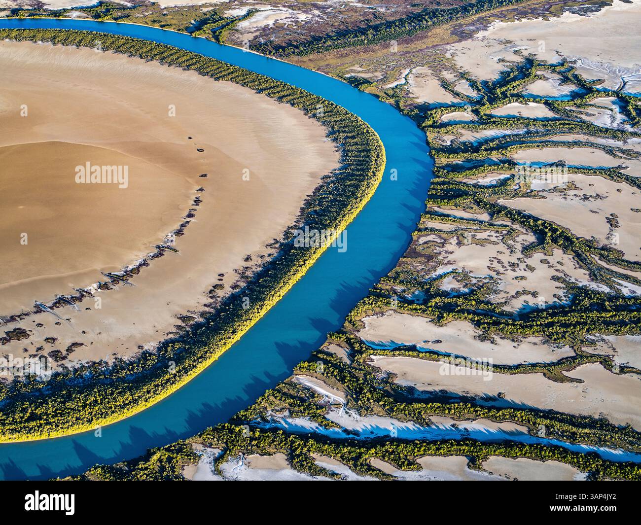 Aerial view of winding river and mangroves in Accident Inlet, Gulf of ...