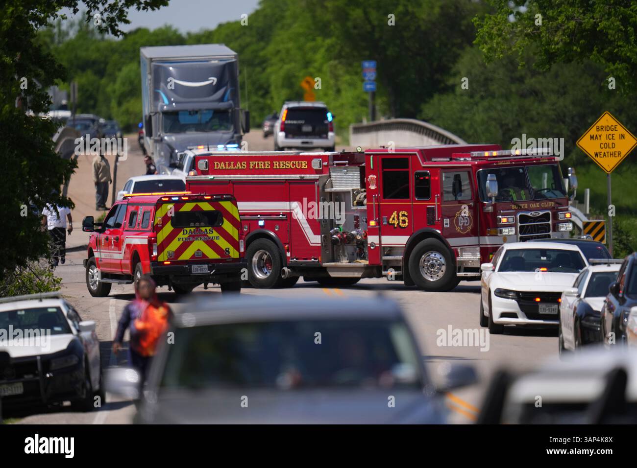 A fire engine blocks a road accessing Wilmer-Hutchins High School ...