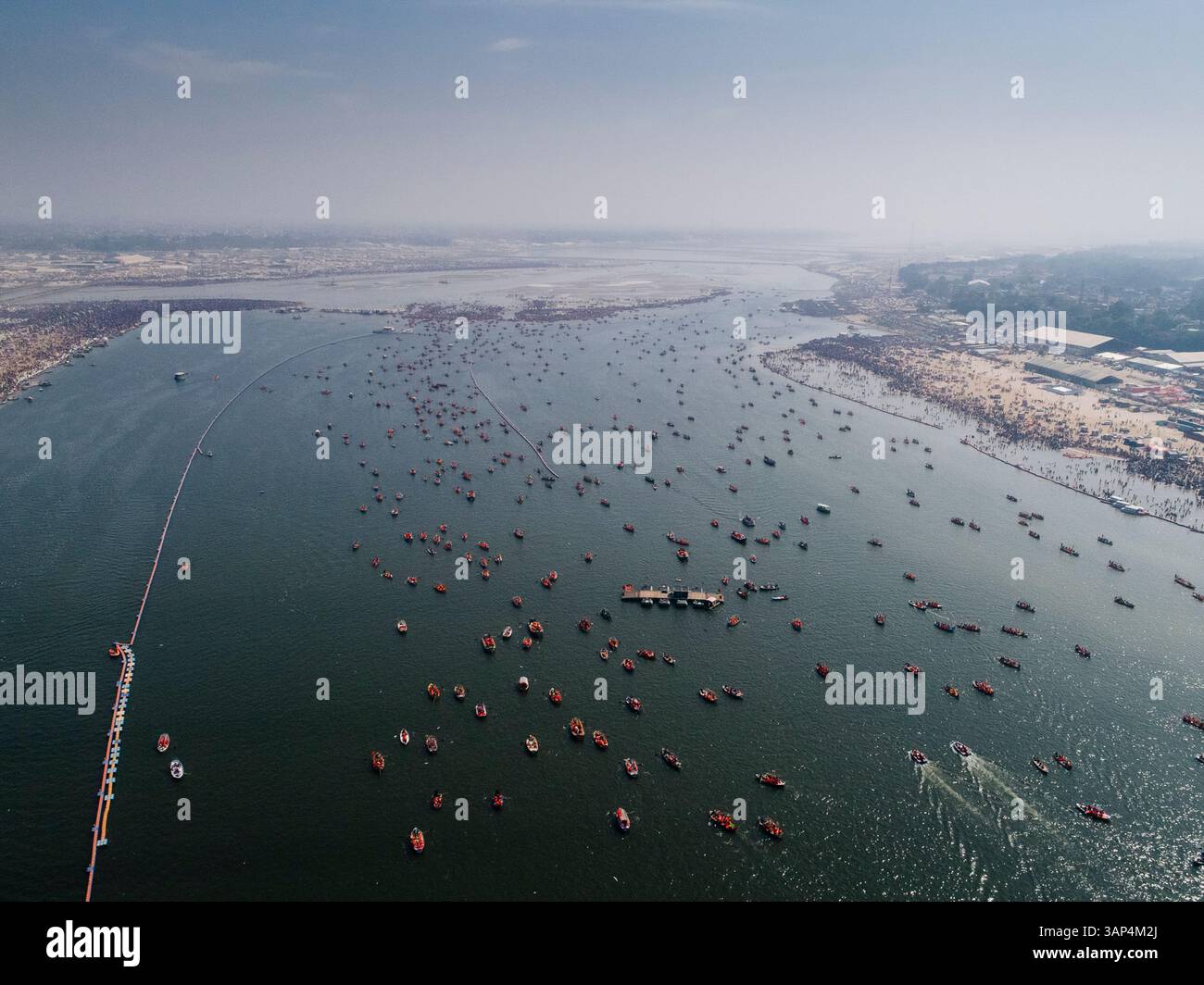 Aerial View of people gathering for Prayag Kumbh Mela along the Yamuna ...