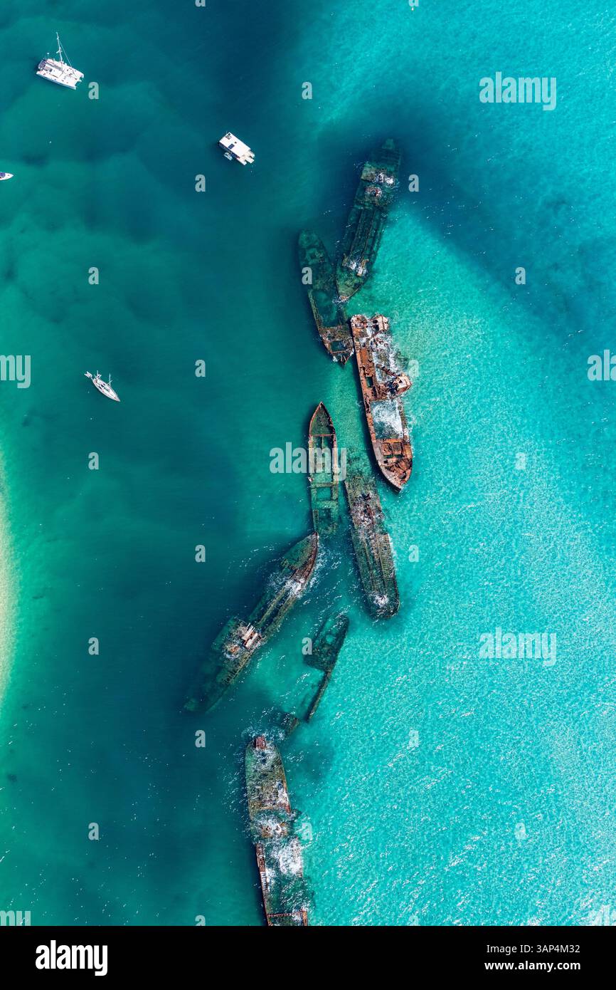 Aerial view of Tangalooma ship wrecks and clear blue ocean, Moreton ...
