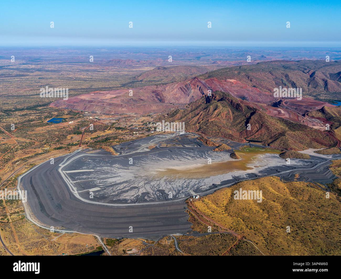 Aerial view of breathtaking canyon, mountains, and mining area in the ...