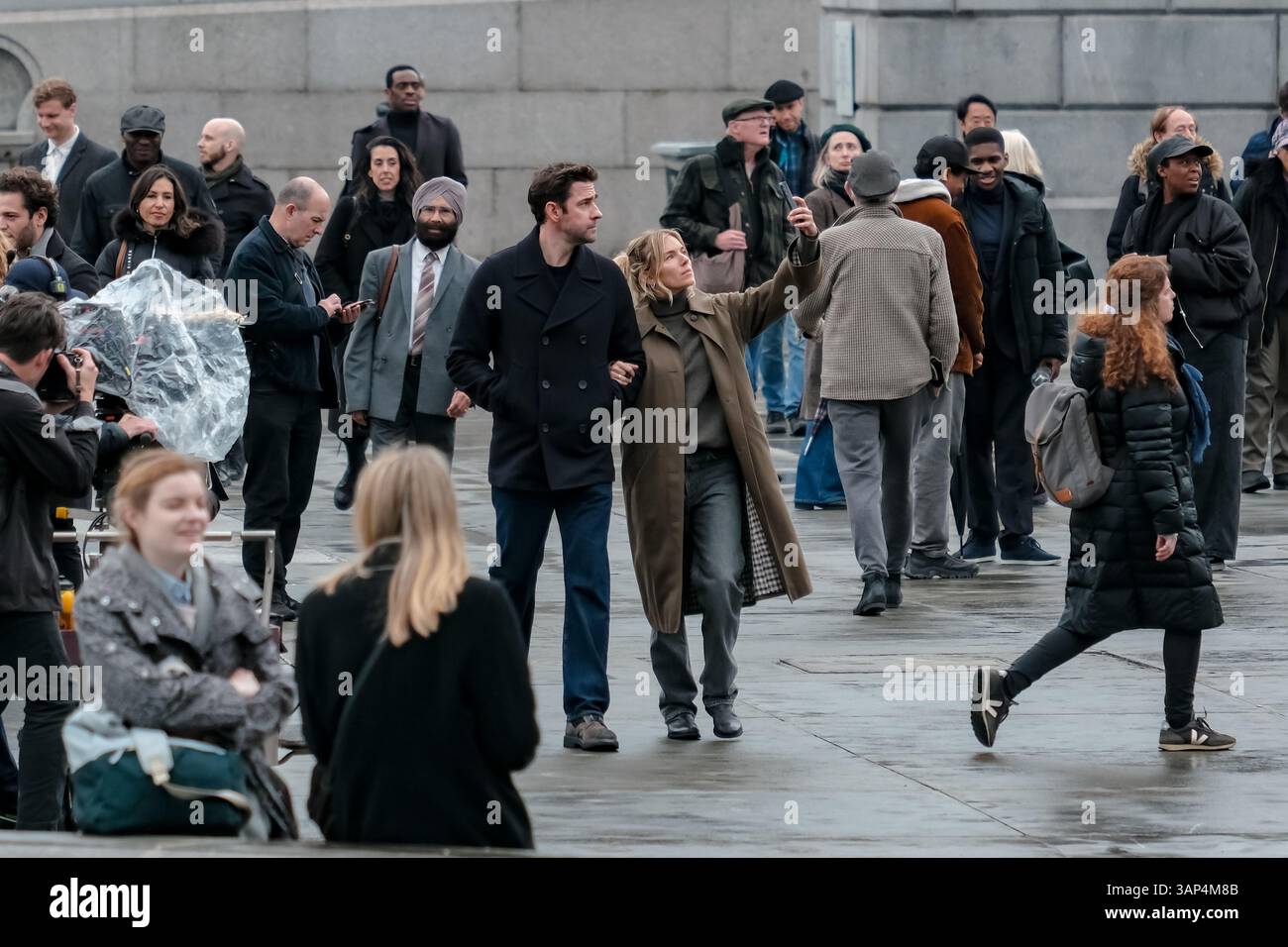 London, UK. 15th April, 2025. Actors Sienna Miller and John Krasinski ...