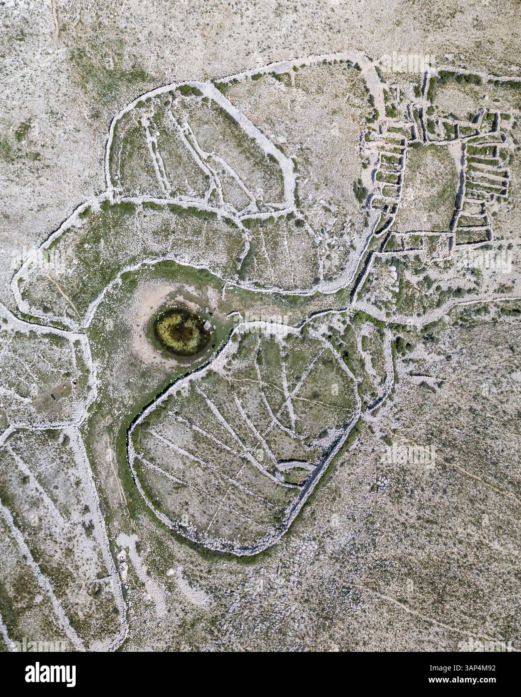 Aerial view of Coki Baska Island with ancient ruins and archeological ...