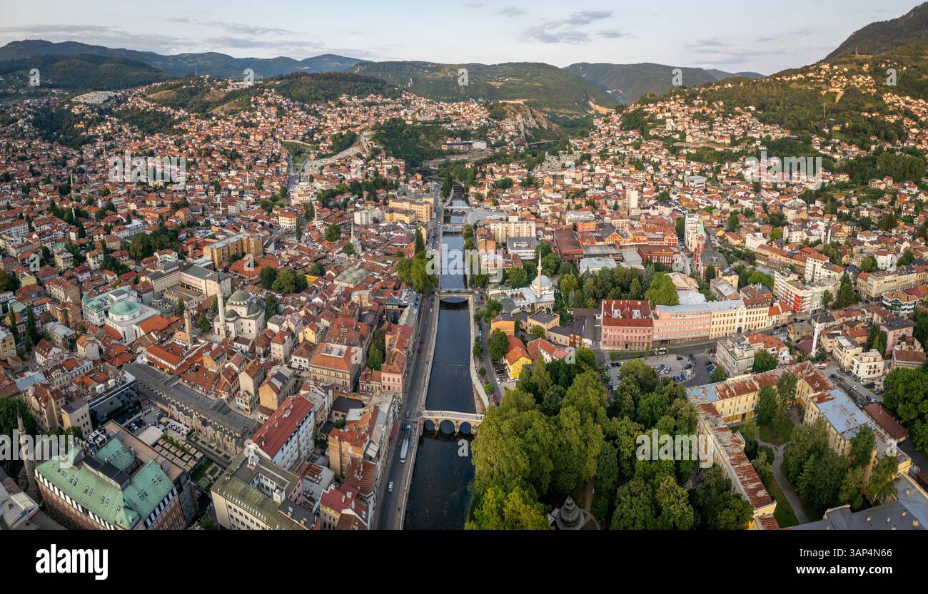 Aerial view of Bascarsija and the Miljacka river surrounded by scenic ...