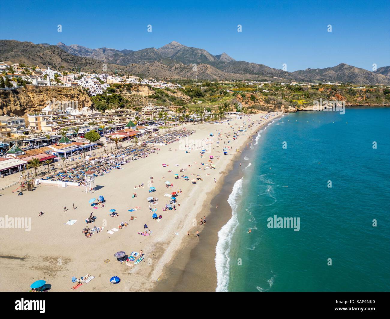 Aerial view of crowded beach and Mediterranean sea, Nerja, Spain Stock ...