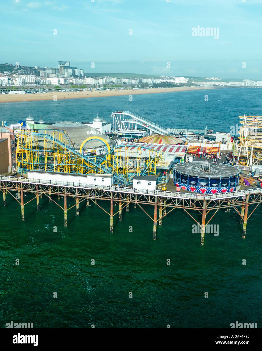 Aerial view of Brighton Palace Pier along the coastline facing the ...