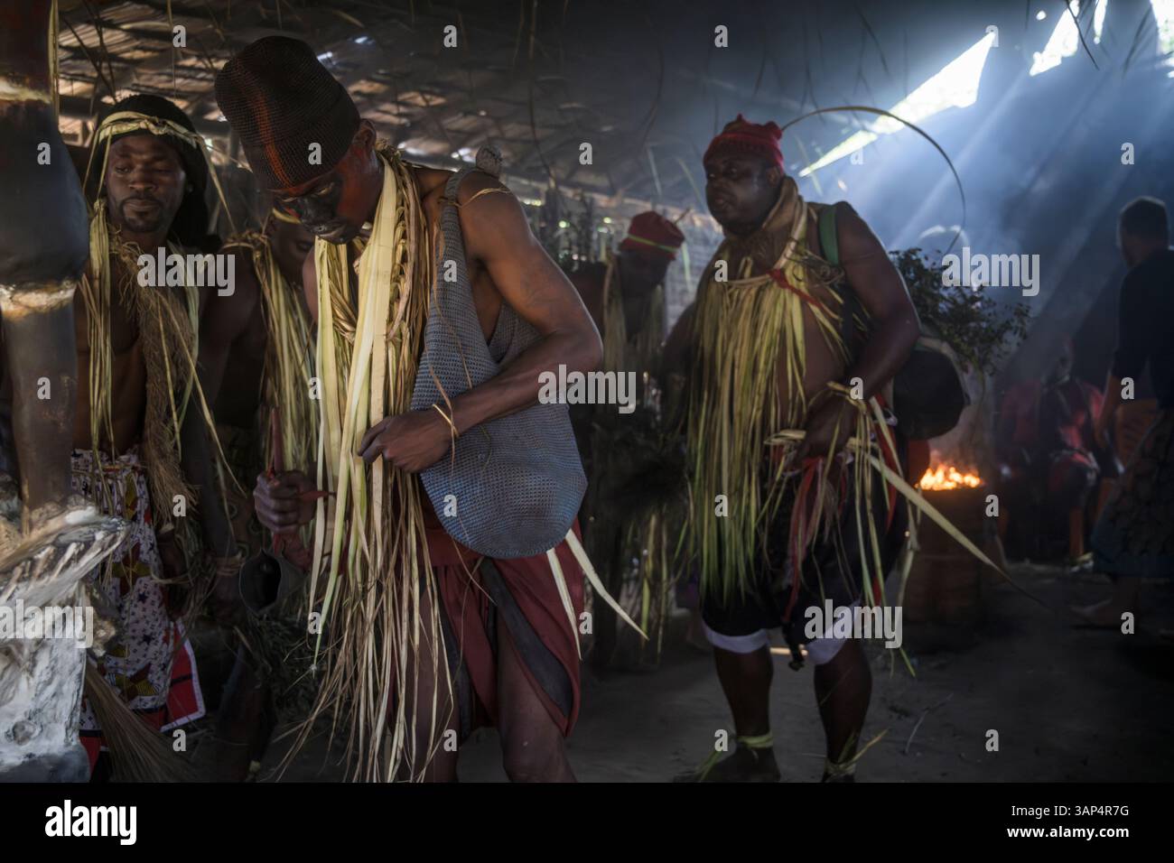 Dancers dressed in traditional ceremonial attire dancing in the morning ...
