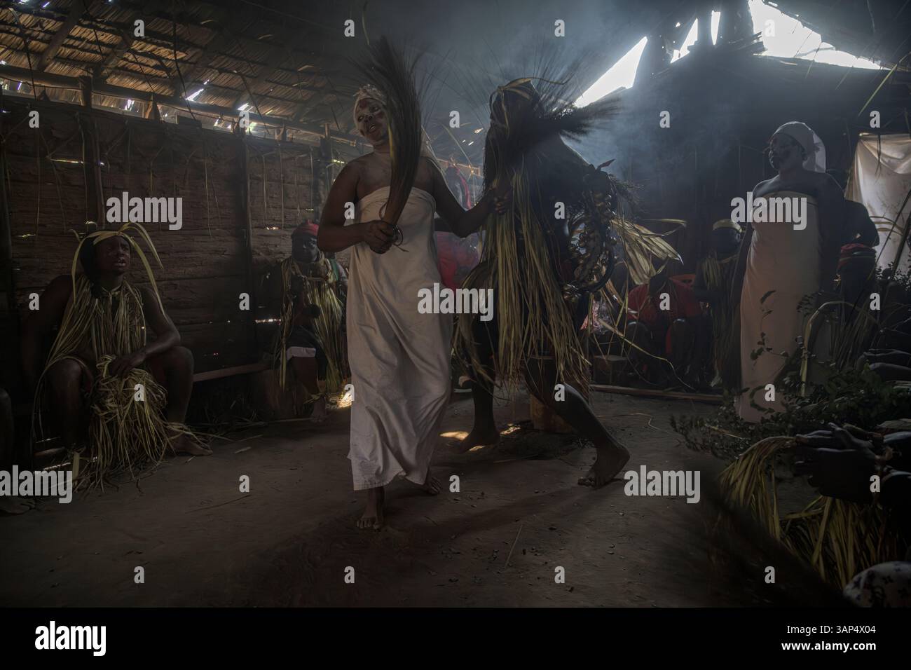 Traditional dance in the early morning inside a small temple where an ...