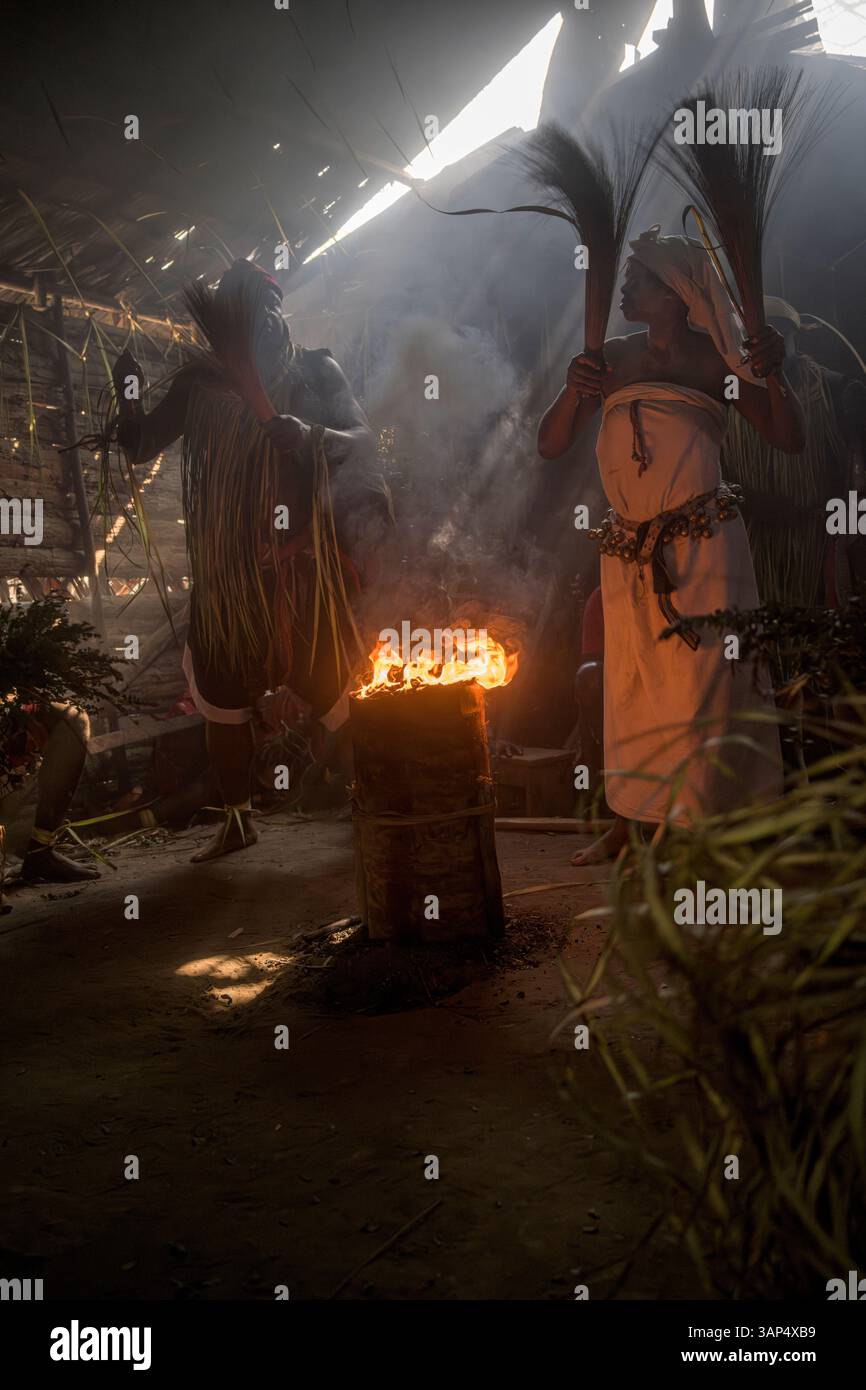 Traditional dance in the early morning inside a small temple where an ...
