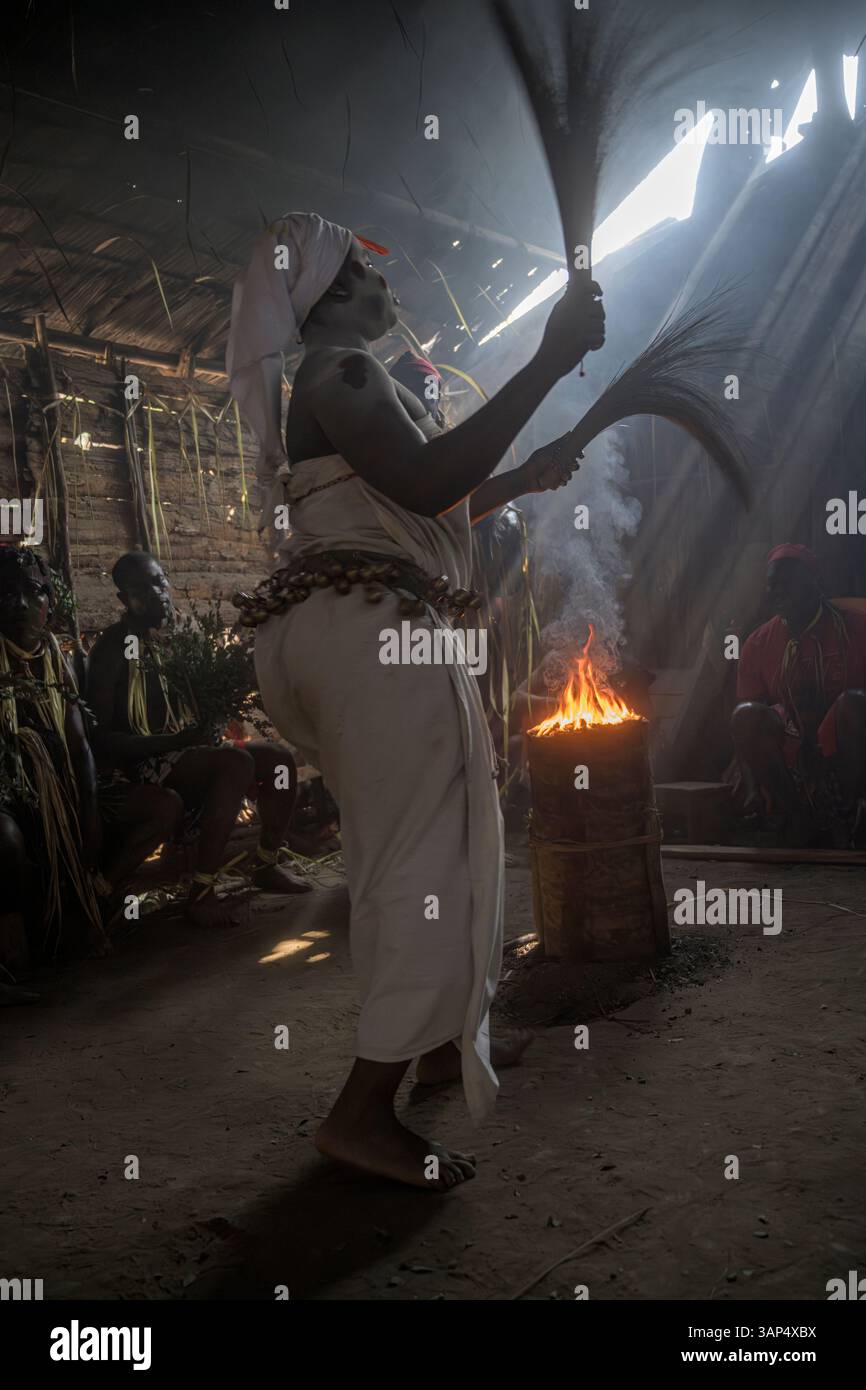 Traditional dance in the early morning inside a small temple where an ...