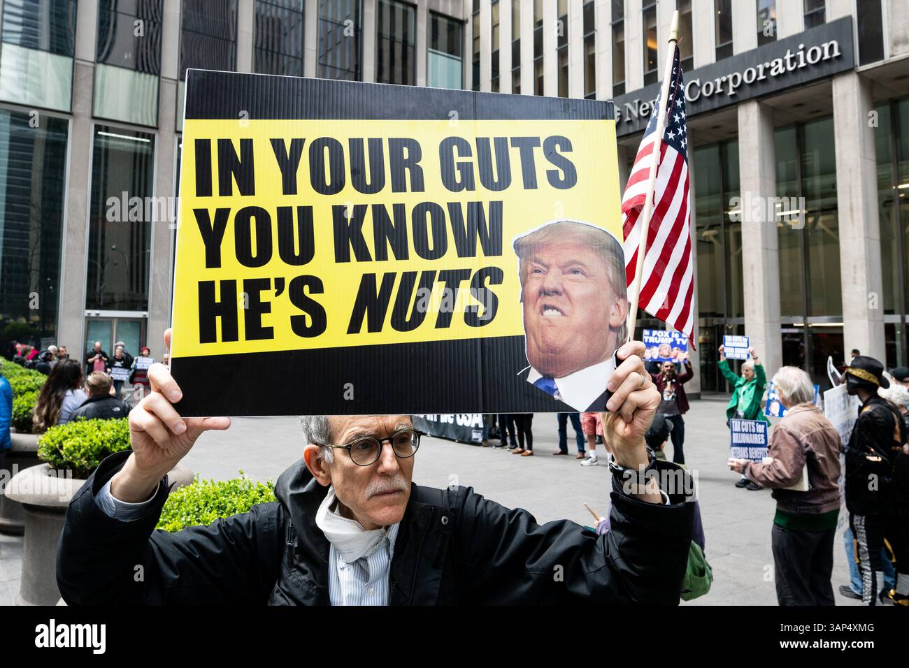 New York City, United States. 15th Apr, 2025. A person with a sign ...