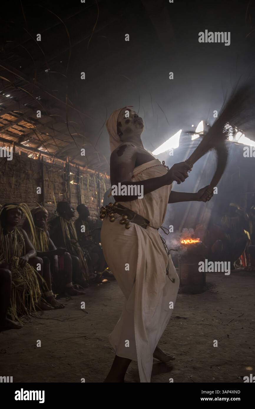 Traditional dance in the early morning inside a small temple where an ...
