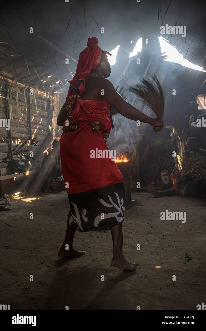 Traditional dance in the early morning inside a small temple where an ...