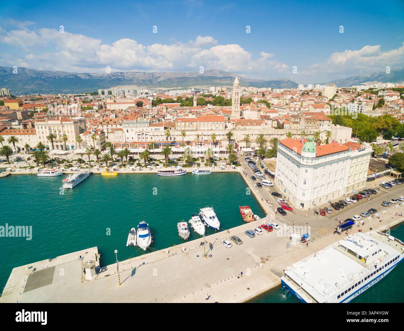 Aerial view of Riva promenade, Diocletian's palace and docked boats in ...