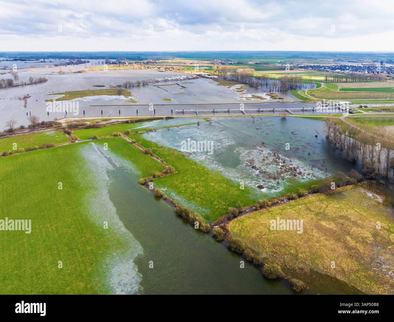 Aerial view of partly flooded and frozen floodplains during high water ...
