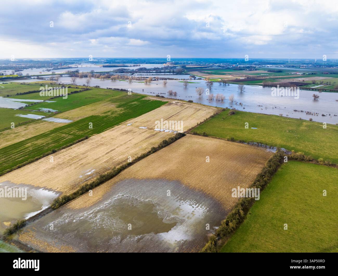 Aerial view of partly flooded and frozen floodplains during high water ...