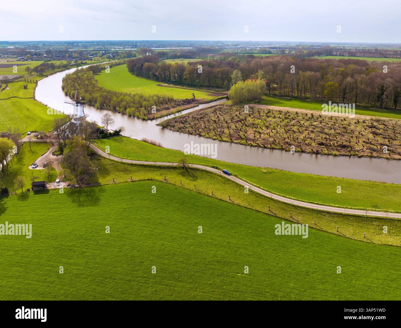 Aerial view of river Linge, pollarded willows and mill, Marienwaerdt ...