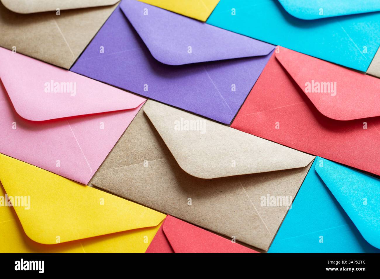 Colorful envelopes arranged side by side in rows Stock Photo - Alamy