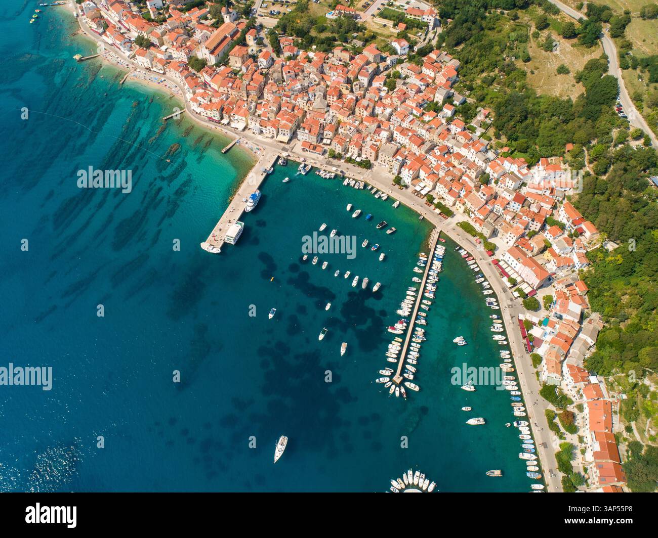 Aerial view above of Baška boat pier during the summer, Croatia Stock ...