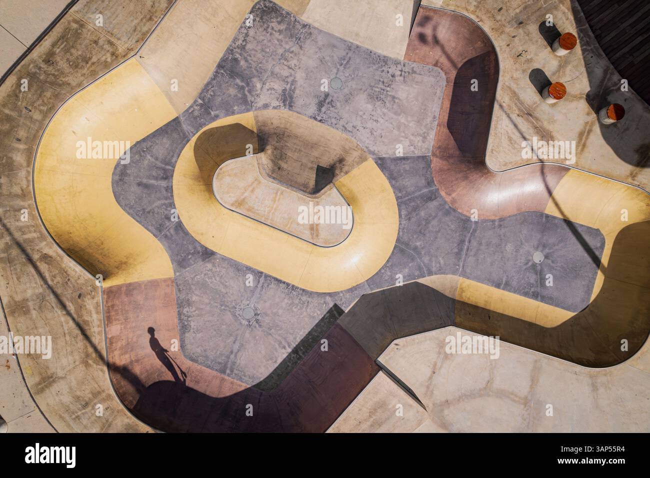 Aerial view of a dynamic and abstract skatepark with geometric patterns ...