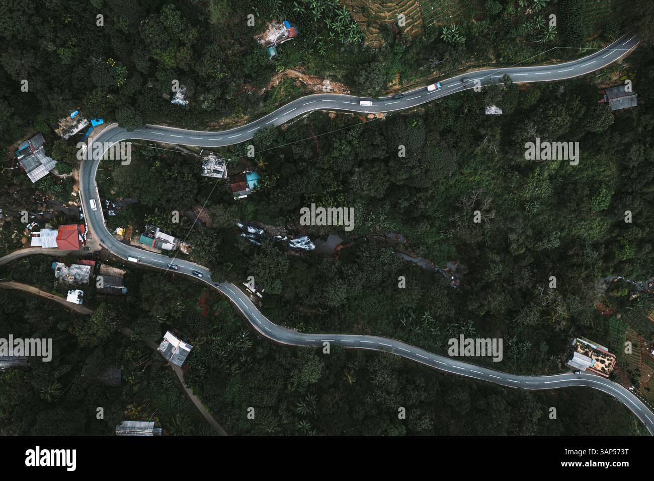 Aerial top down view of winding mountain road near Ella, Sri Lanka ...