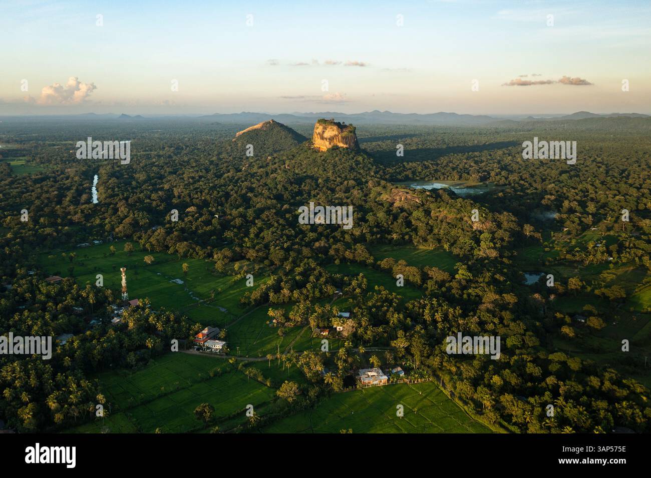 Aerial view of Sigiriya Rock Fortress called Lion Rock during sunset ...