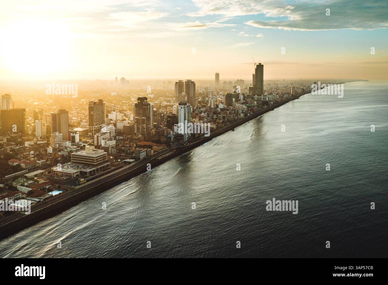 Aerial view of sunrise over Colombo city metropolis standing near ...
