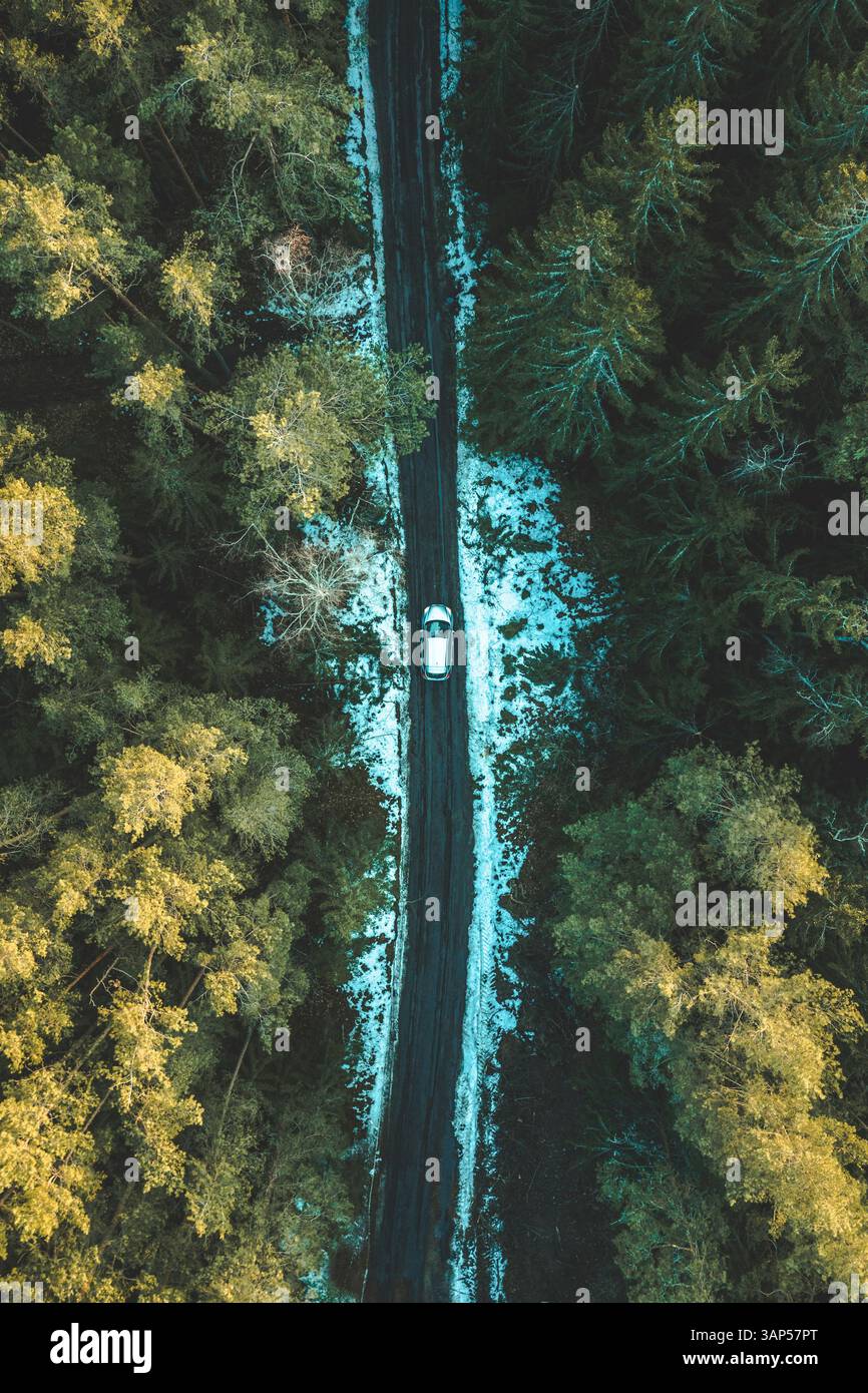 Aerial top down view of silver car driving in off-road way in the ...