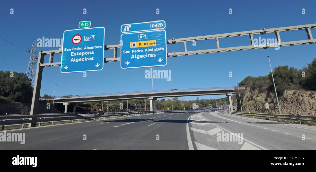 Road signs indicating directions to several destinations near Marbella ...