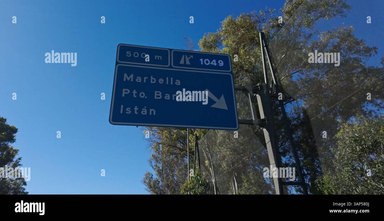 Road sign indicating the direction to Marbella, Puerto Banus and Istan ...