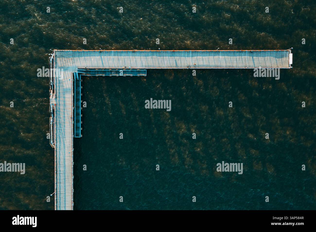 Aerial view of L-form pedestrian bridge in Baltic sea near Palanga ...