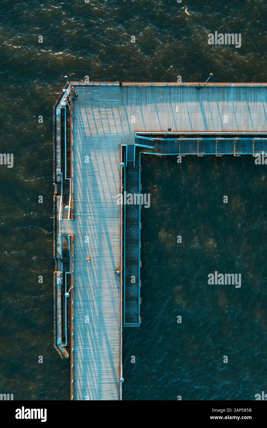 Aerial view of L-form pedestrian bridge in Baltic sea near Palanga ...