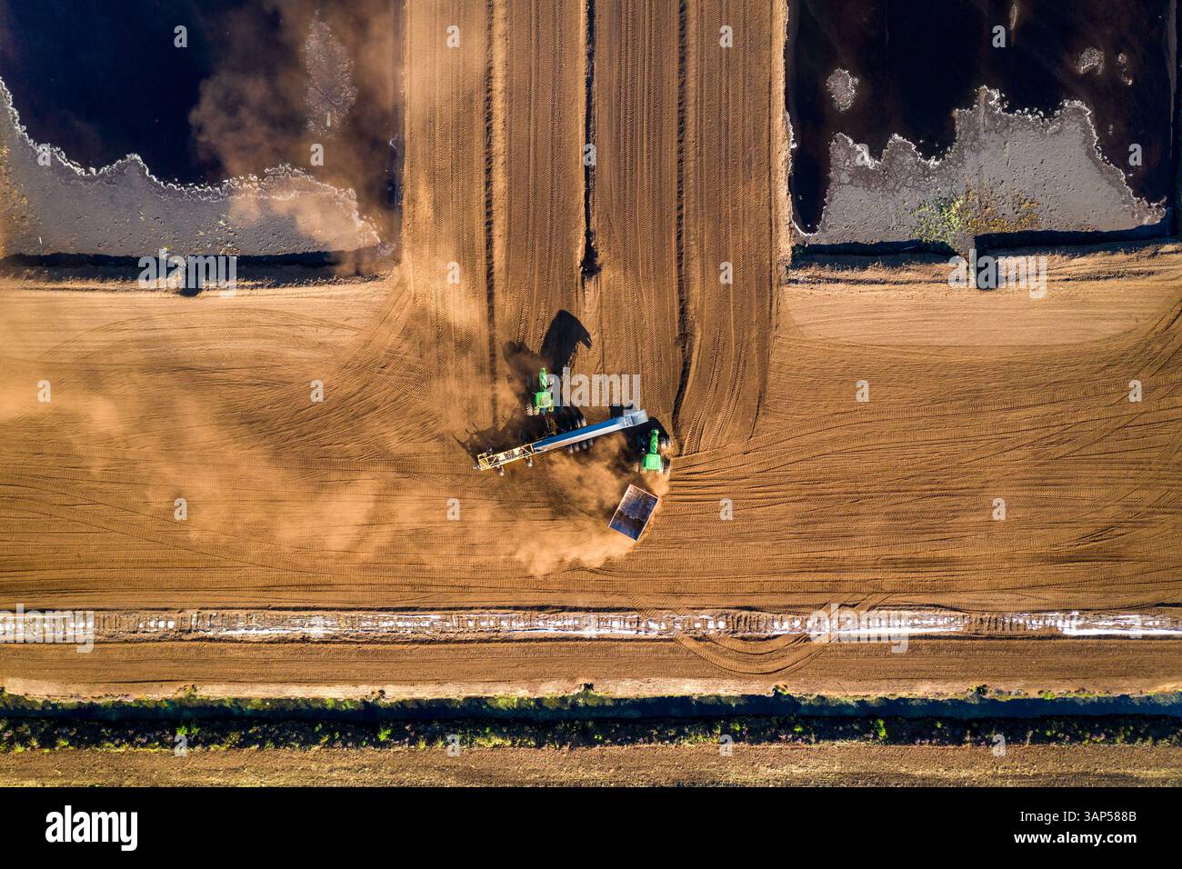 Aerial view of peat bog exploitation for commercial purposes in ...