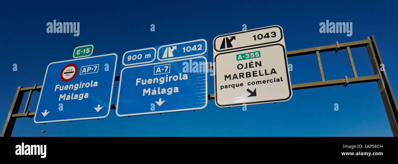Road signs showing directions to Fuengirola, Malaga, Marbella and Ojen ...