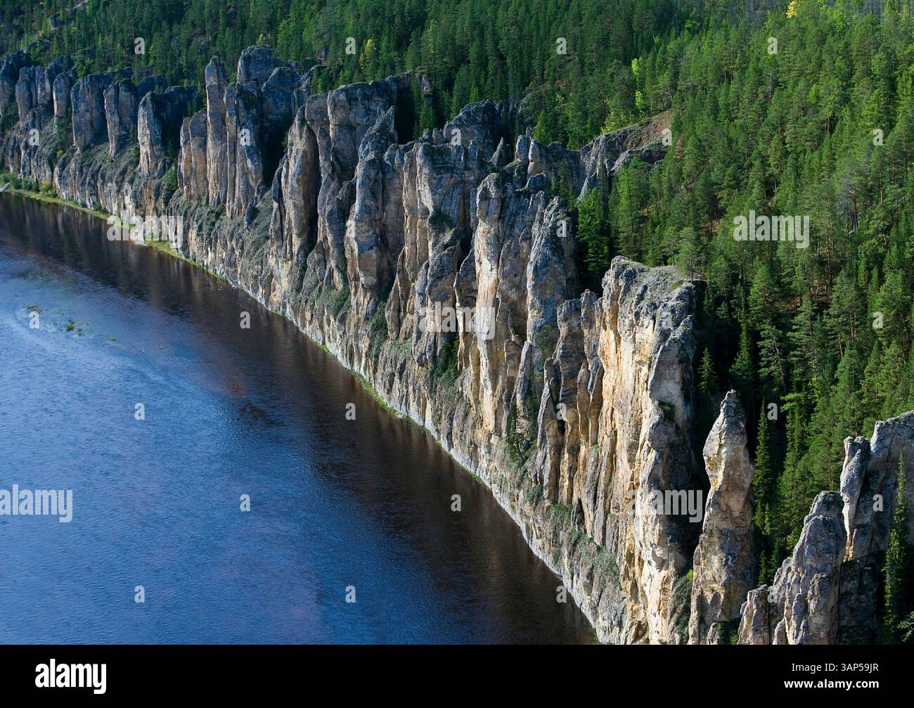 Aerial view of majestic Lena Pillars and serene river surrounded by ...