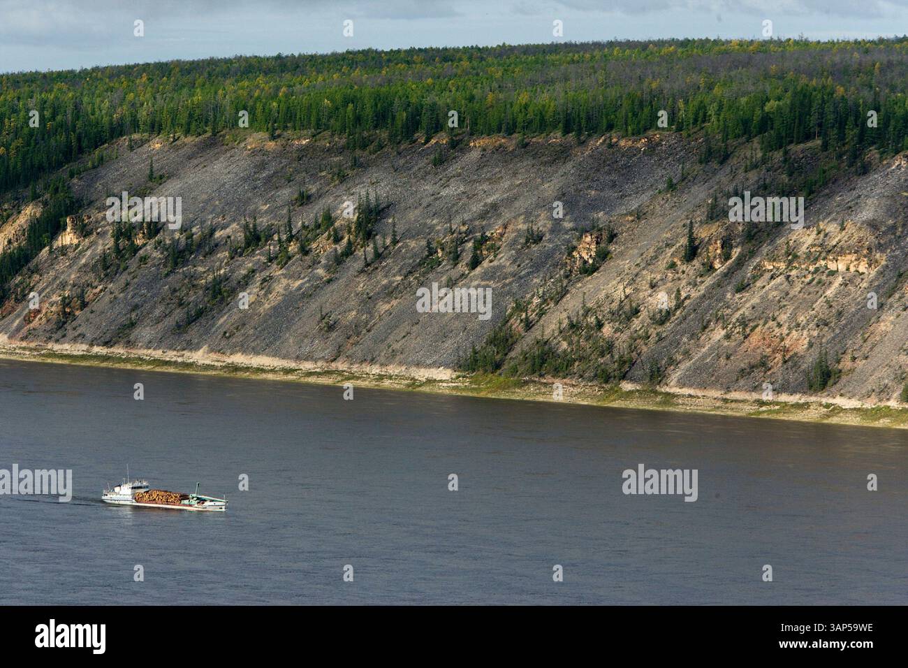 Aerial view of serene Lena Pillars with majestic cliffs and a tranquil ...